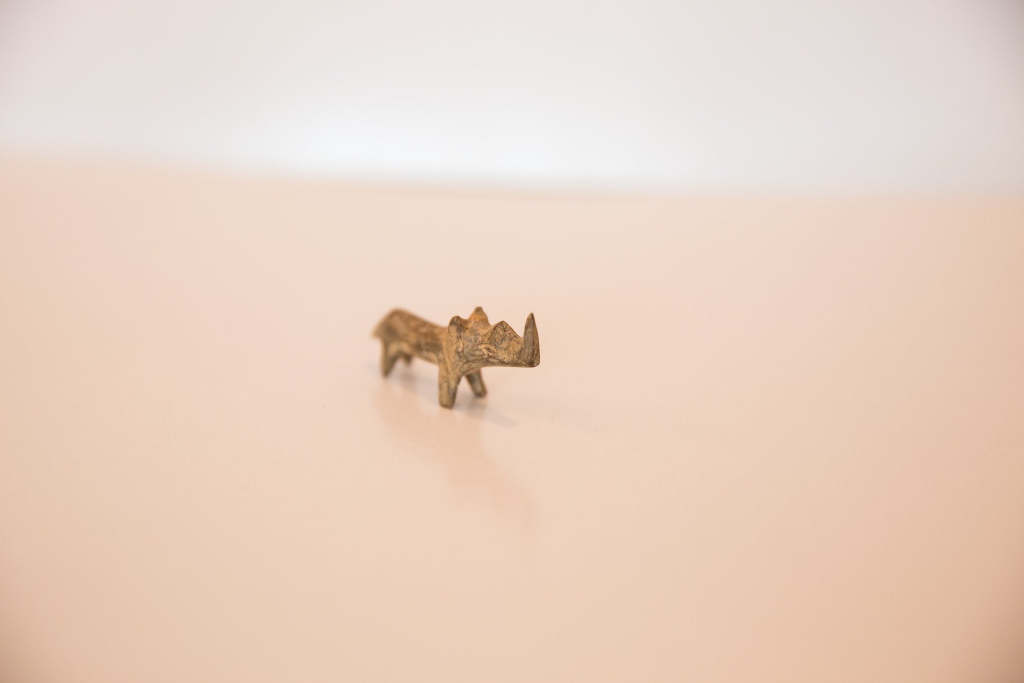 Handmade African Miniature Rhinoceros with Dusty Patina Casting